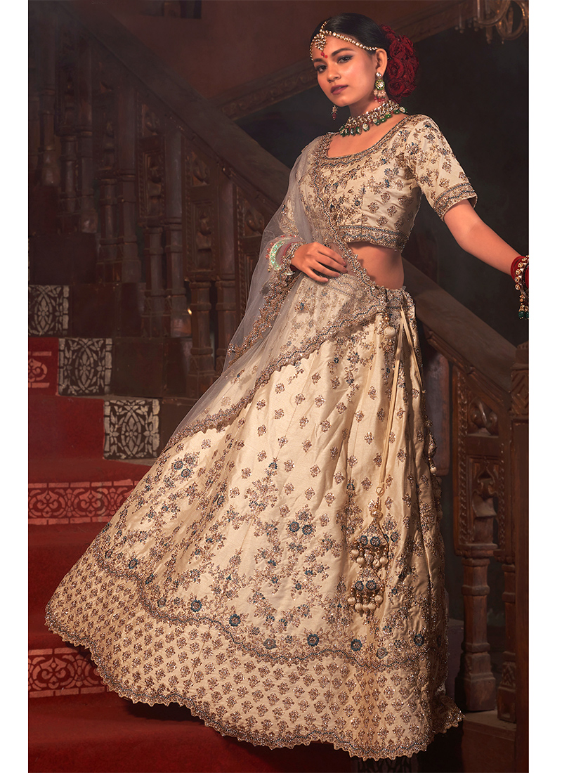 Buy Cream Net Reception Wear Mirror Work Lehenga Choli Online From ...