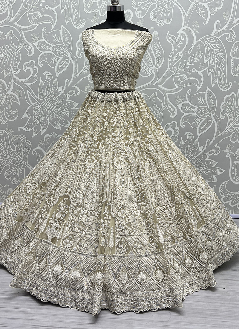 Buy Cream Net Wedding Wear Embroidery Work Lehenga Choli Online From ...