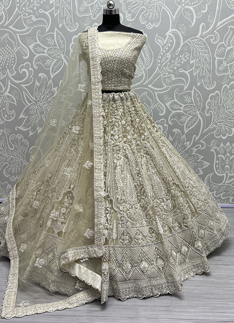 Buy Cream Net Wedding Wear Embroidery Work Lehenga Choli Online From ...